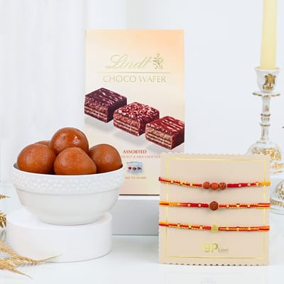 Buy/Send Spiritual Rakhis And Sweets Hamper Online | IGP | JVS1420034